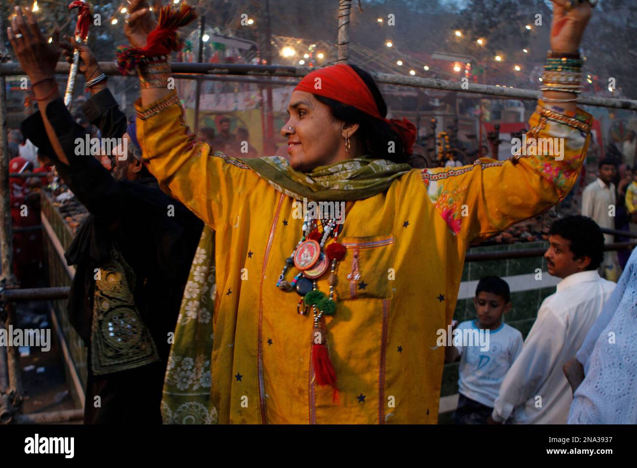 Pakistani devotees dance at a shrine of famous Sufi Madhu Lal Shah ...