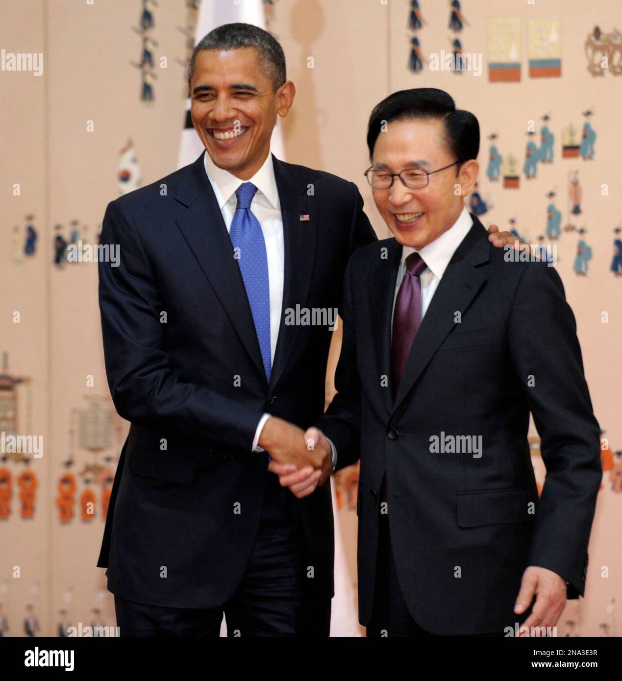 President Barack Obama, left, poses for a photo with South Korean ...