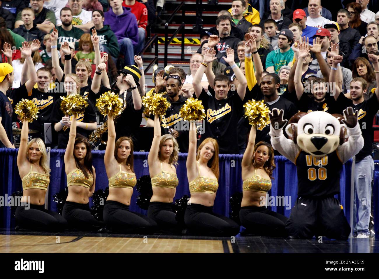 VCU cheerleaders, mascot, fans and band members are shown during their ...