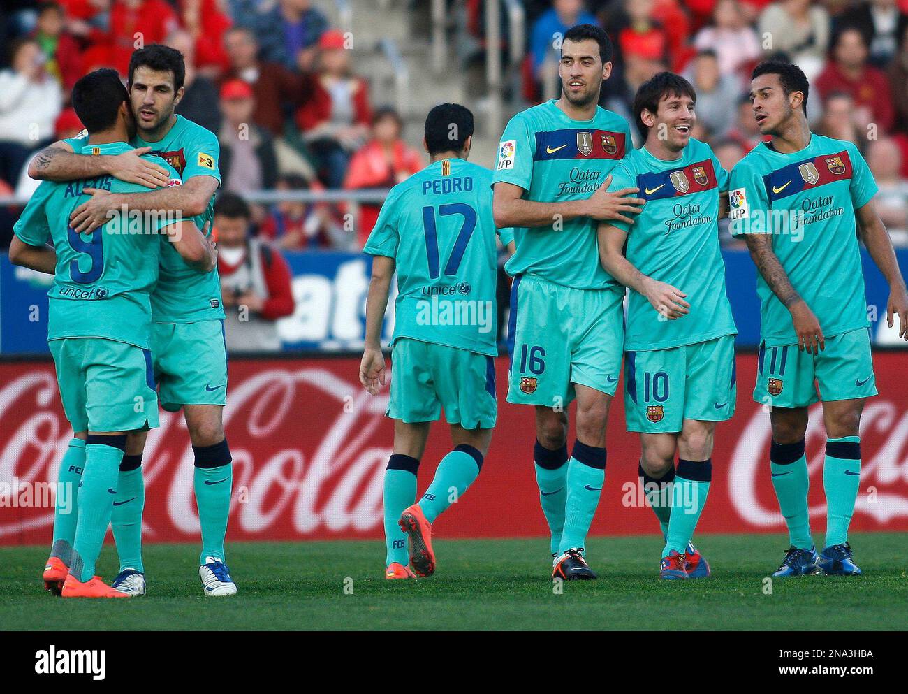 FC Barcelona's Alexis Sanchez from Chile, left, celebrates his goal ...