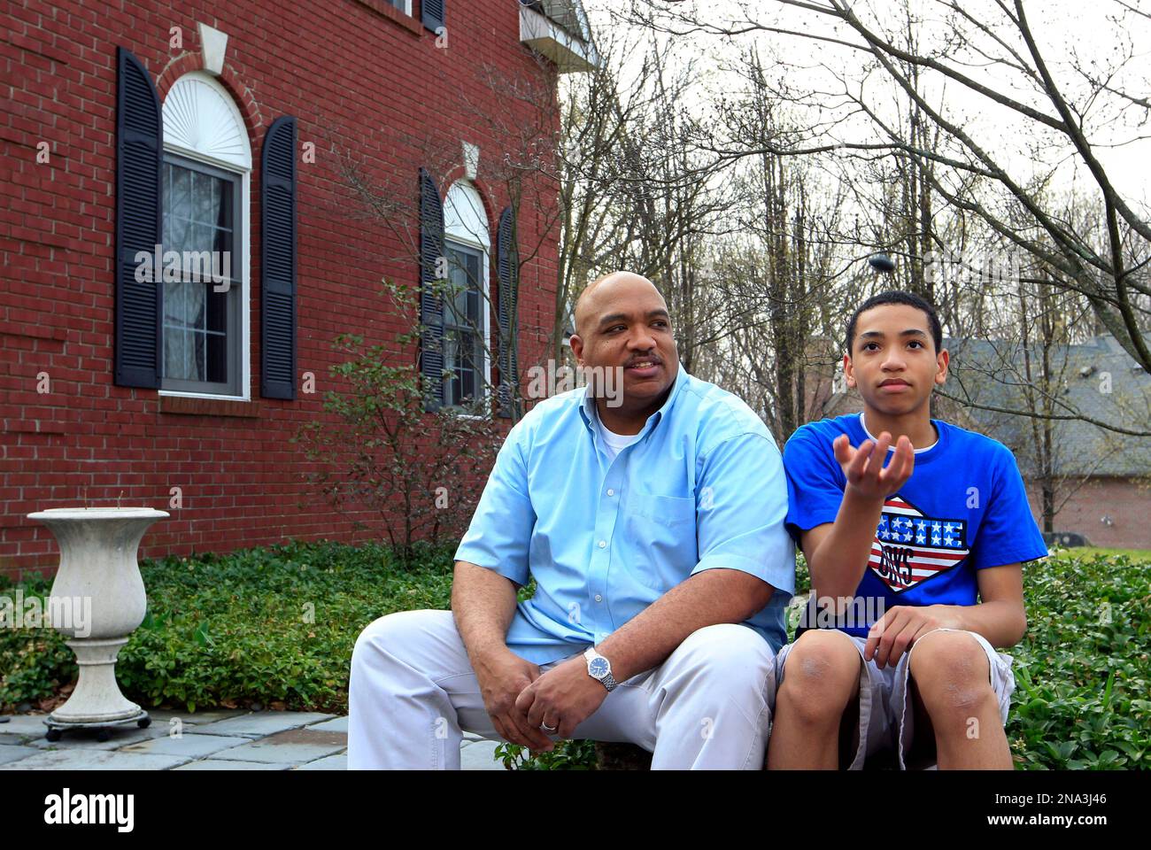 In this Friday, March 23, 2012 photo, Bill Stephney talks to his son ...