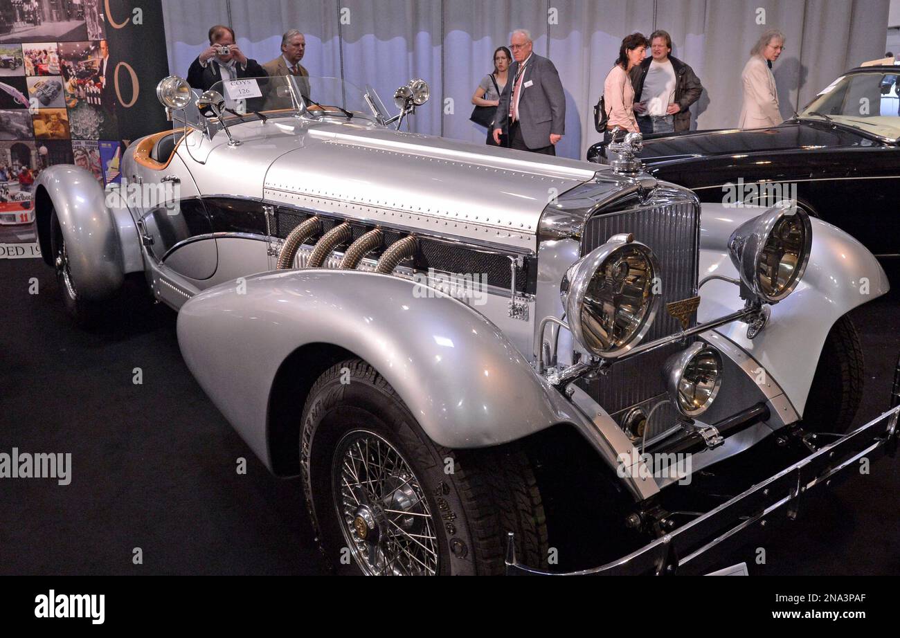 Visitors watching a 1929 Stutz 8 Speedster at the 24th Techno Classica ...