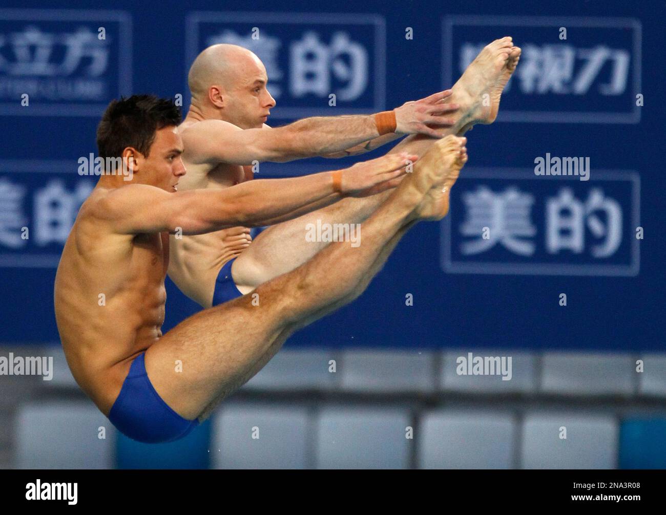 British diver Thomas Daley, front, and his compatriot Peter Waterfield ...