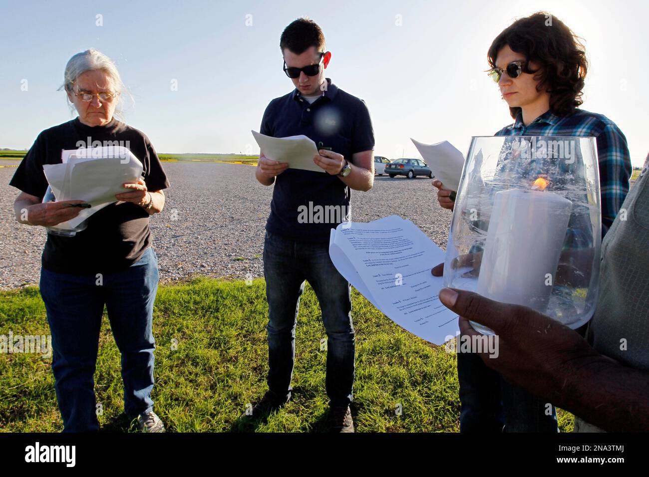 Death penalty opponents Sheila O'Flaherty, left, Michael Fender and ...