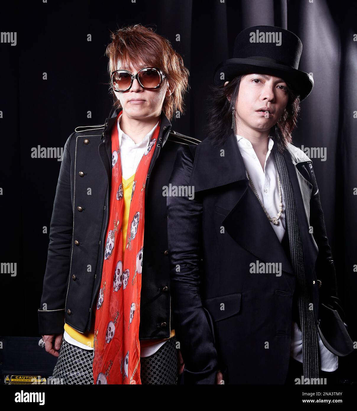 Members of the Japanese band 'L'arc En Ciel' tetsuya, left and hyde ...