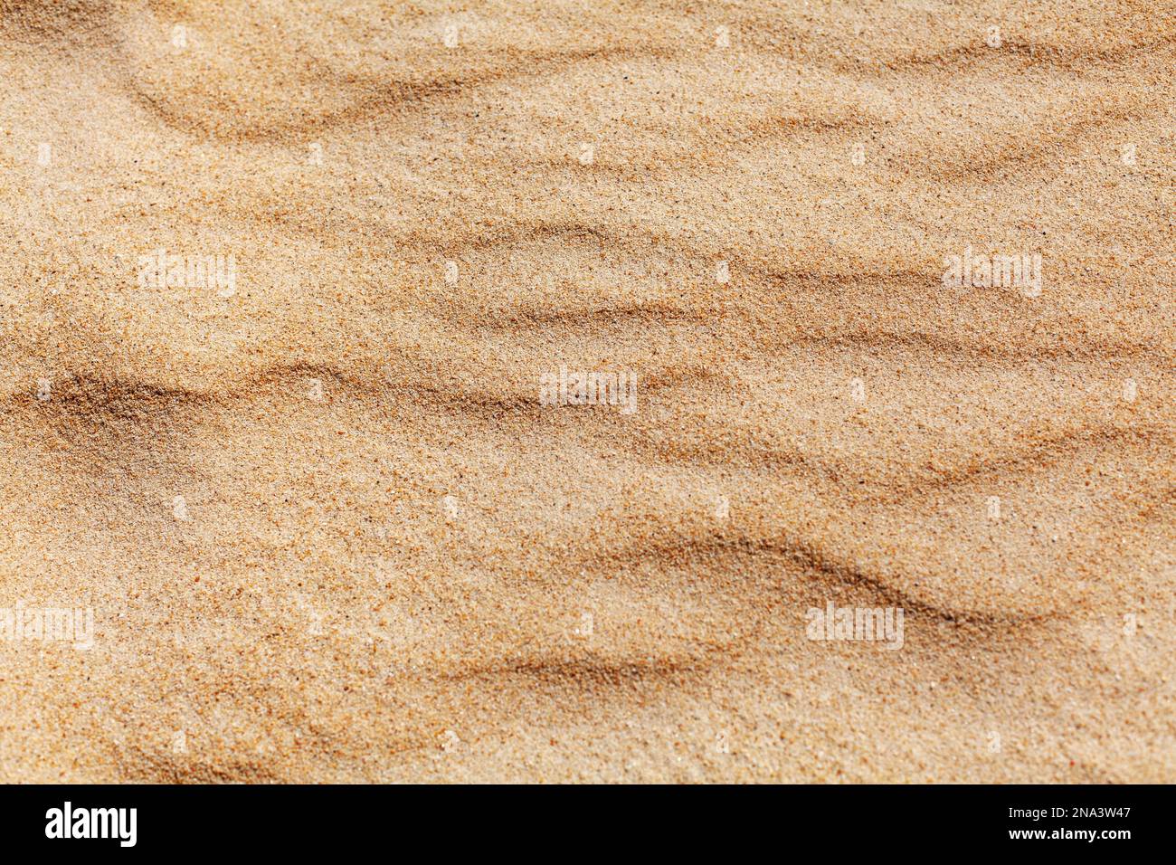 Wavy yellow sand texture closeup background, sandy waves pattern ...