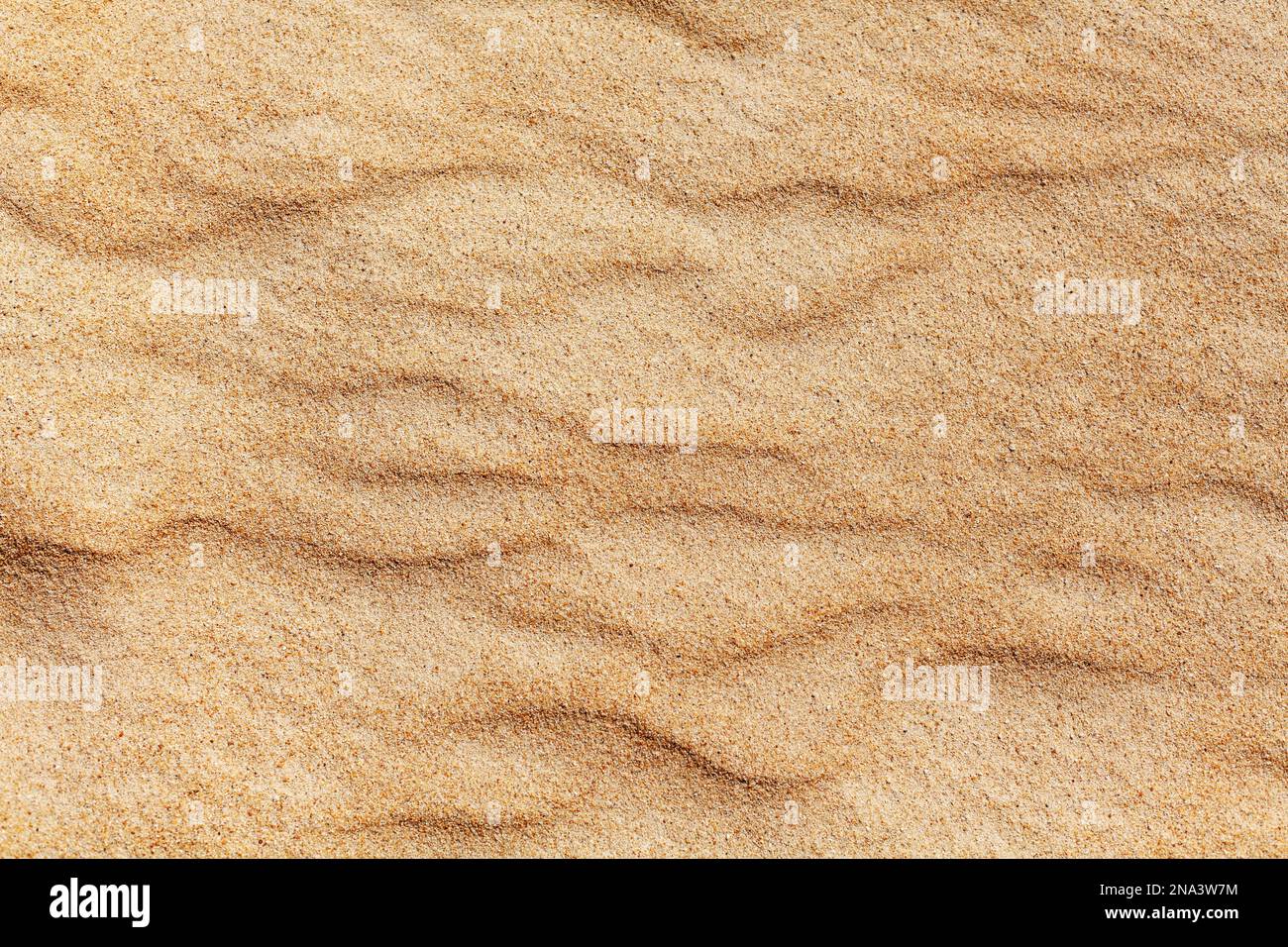 Wavy yellow sand texture closeup background, sandy waves pattern ...