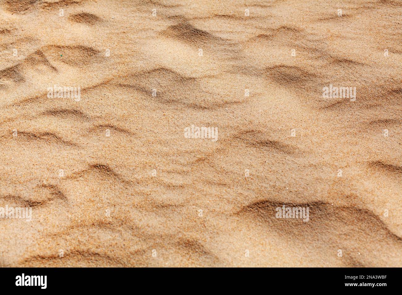 Wavy yellow sand texture closeup background, sandy waves pattern ...