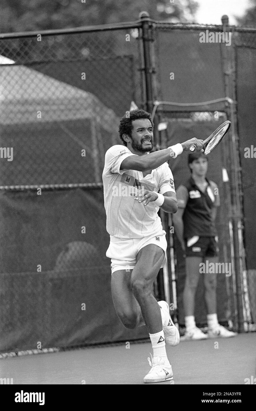 France's Yannick Noah swings through his forehead return playing in the ...
