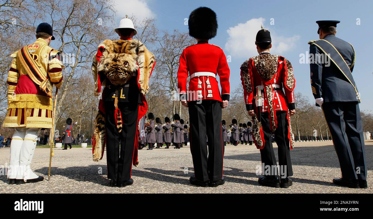 Senior Drum Major Betts of the Scotts Guard, left, Bugler Lee Kidd ...