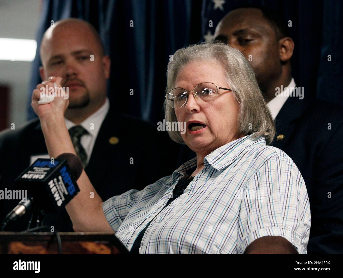 Nancy Hatten, mother of Rhonda Hatten Griffis gestures as recalls ...