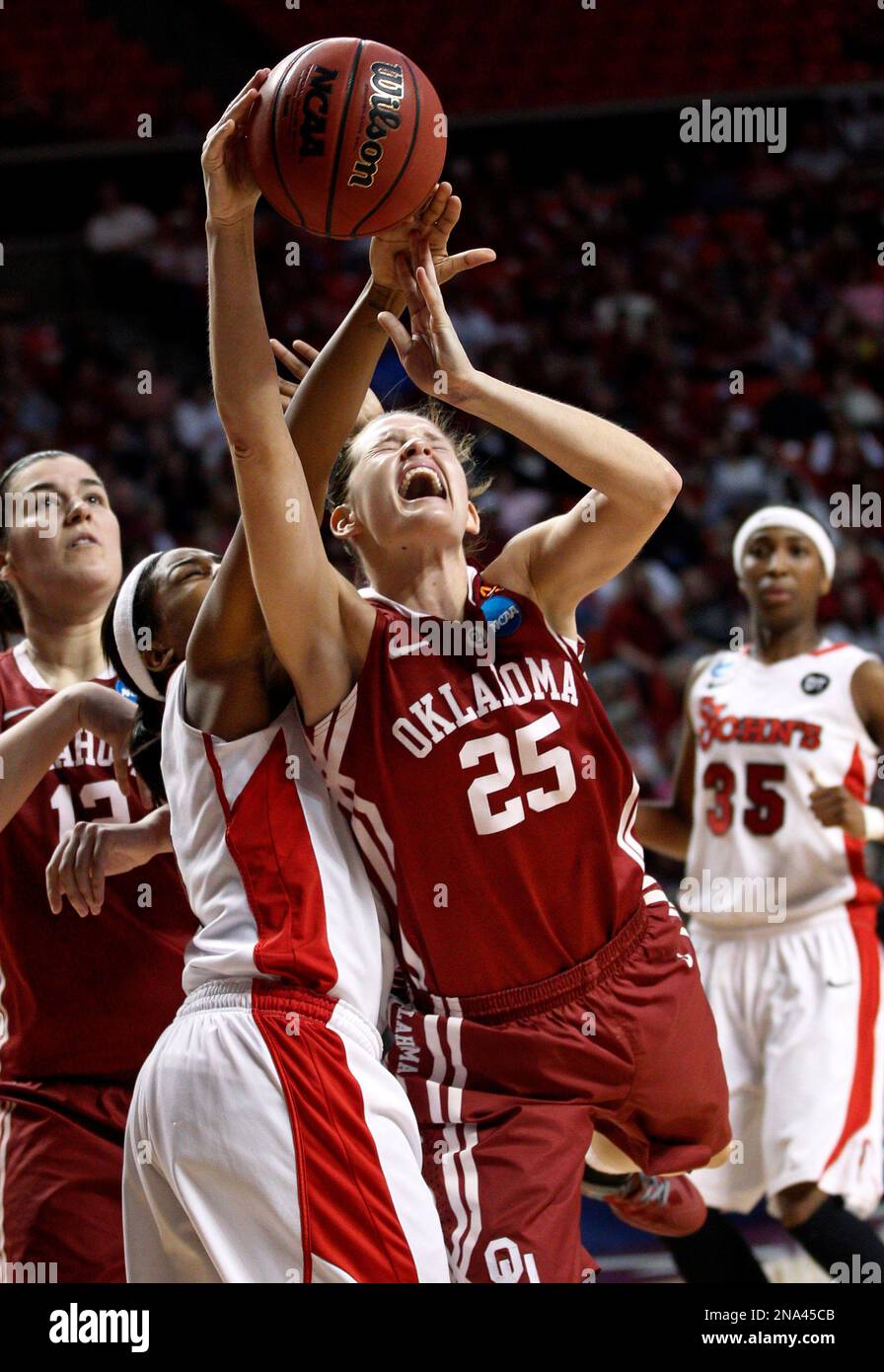 Oklahoma guard Whitney Hand (25) is fouled by St. John's guard Nadirah ...