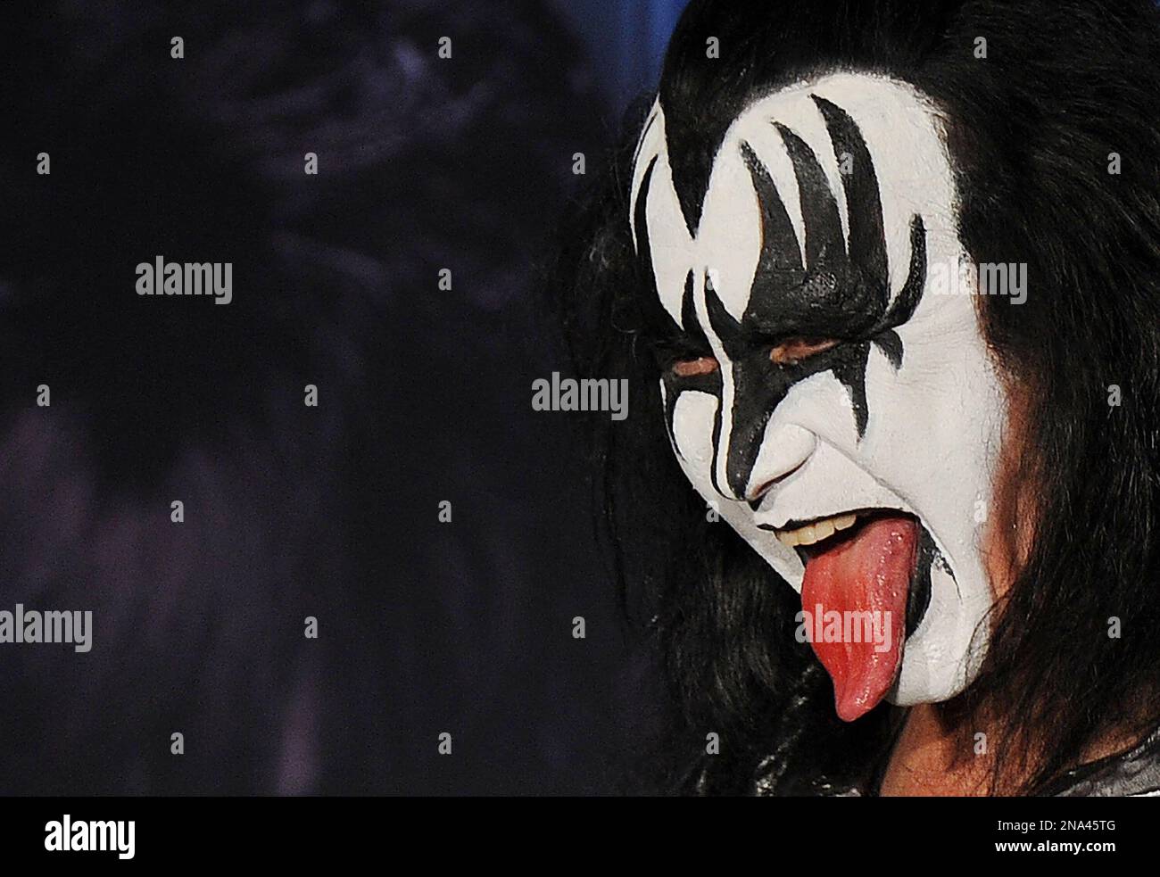 Gene Simmons poses for pictures at Motley Crue and Kiss the 2012 Mega ...