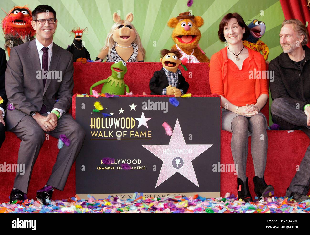 Walt Disney Studios Chairman, Rich Ross, left, poses with Lisa Henson ...