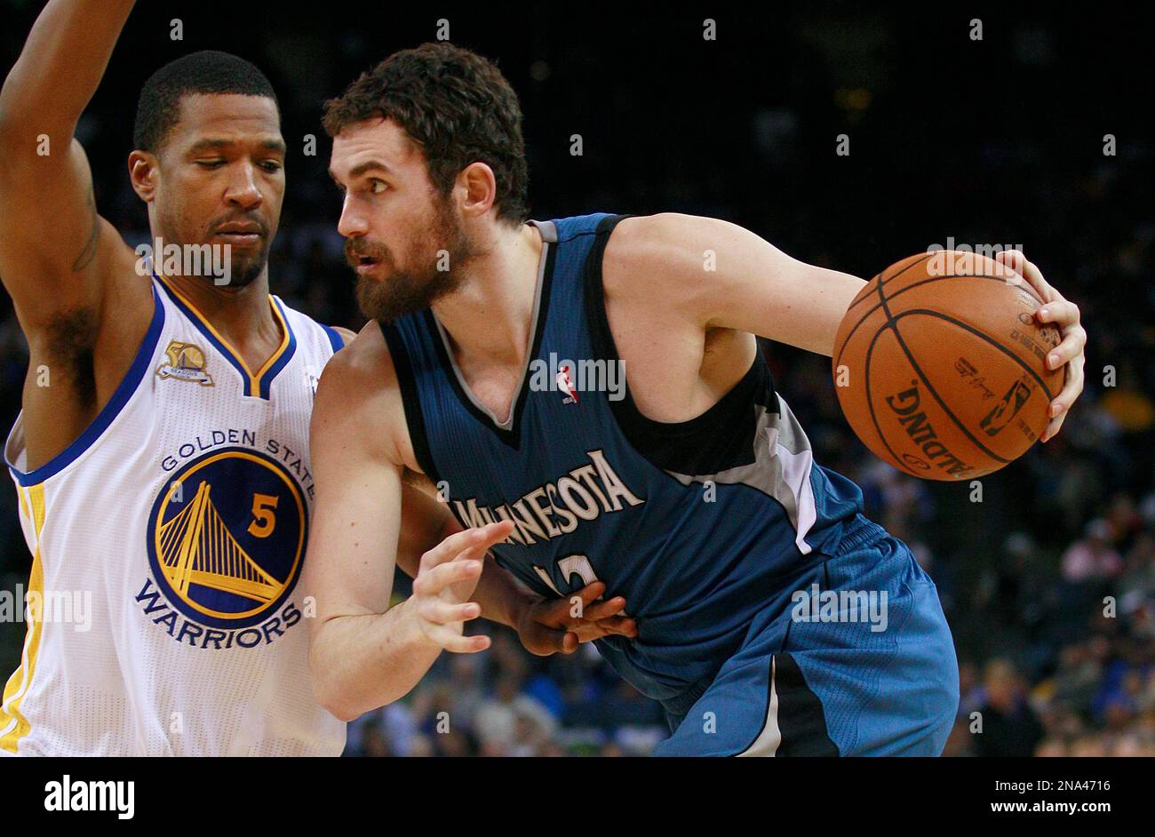 Minnesota Timberwolves power forward Kevin Love (42) dribbles against ...