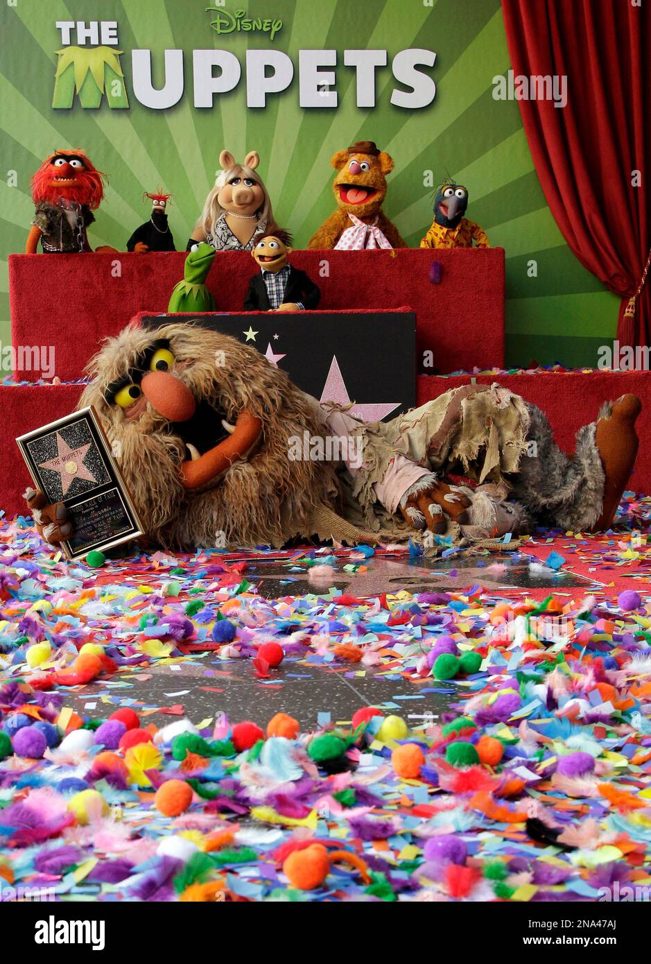 Jim Henson's puppet character, Sweetums the ogre, foreground, poses ...