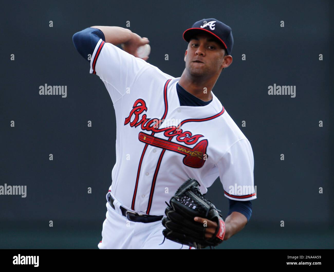 Atlanta Braves starting pitcher Randall Delgado warms up against the St ...