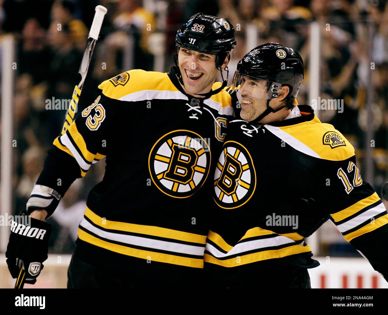 Boston Bruins' Zdeno Chara, left, and Brian Rolston celebrate Chara's ...