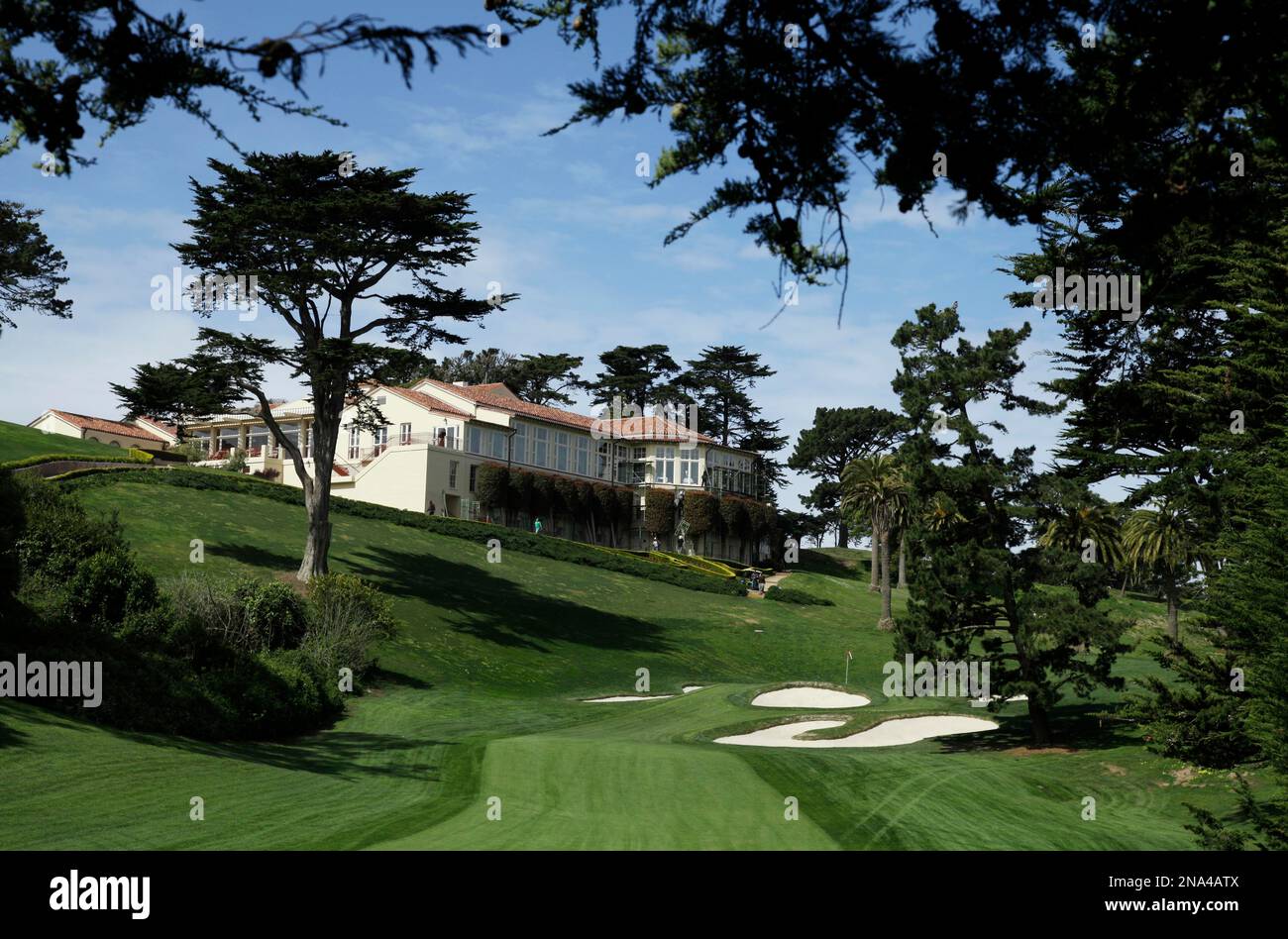 Shown is the clubhouse above the 18th green of the Lake Course at the ...