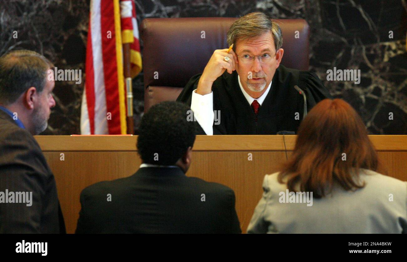 Circuit Court Judge Thane B. Covert talks with attorney's at the start ...