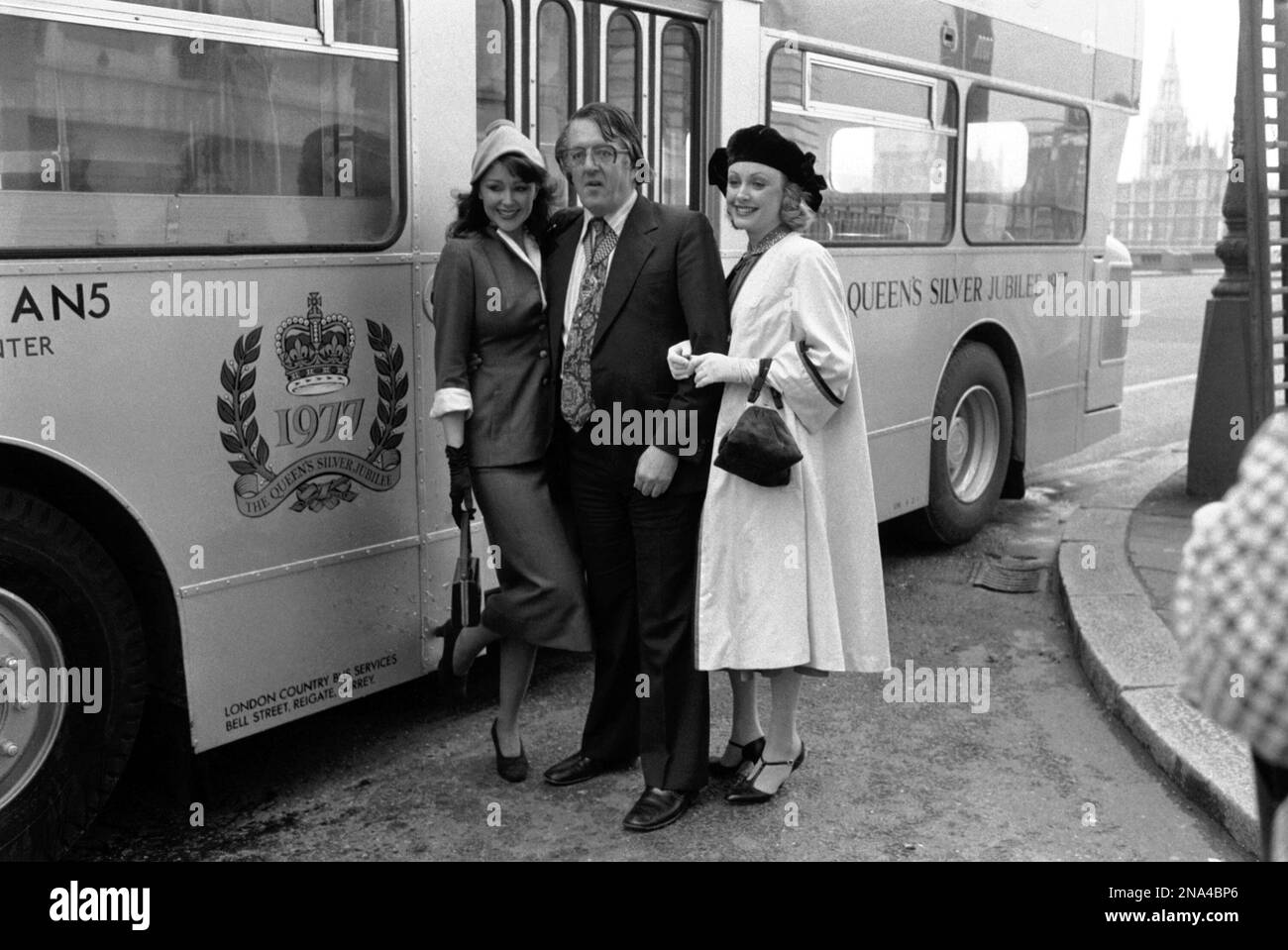 Greater London Council Chairman Lord Ponsonby, is flanked by models ...