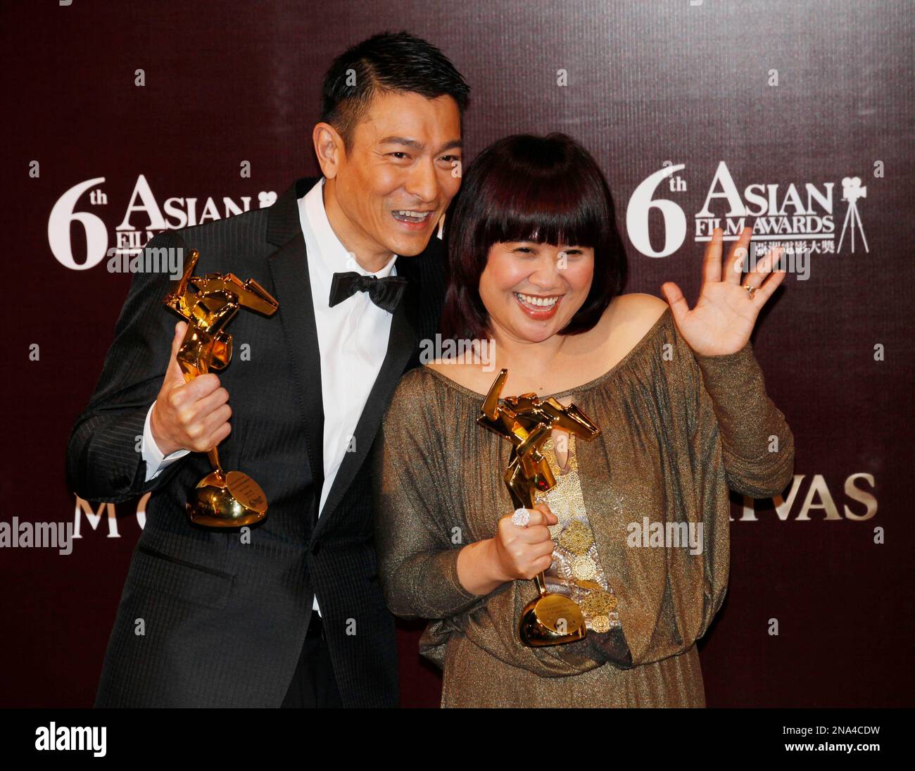 Hong Kong's actor Andy Lau, left poses with Philippine actress Eugene ...