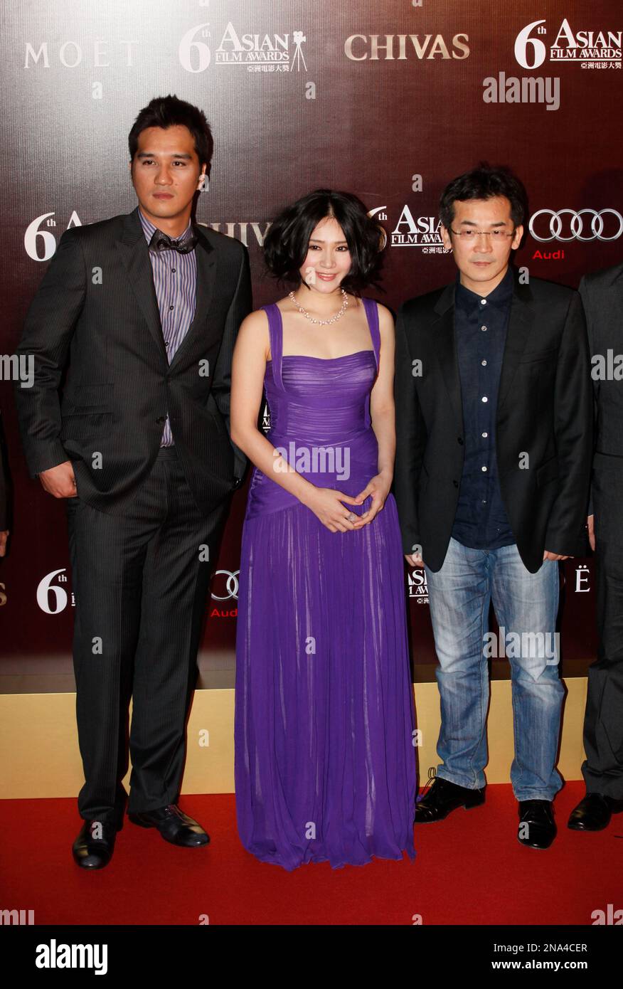From right, Taiwan's director Wei Te-sheng, actress Lo Mei-ling and actor Jimmy Huang pose on ...