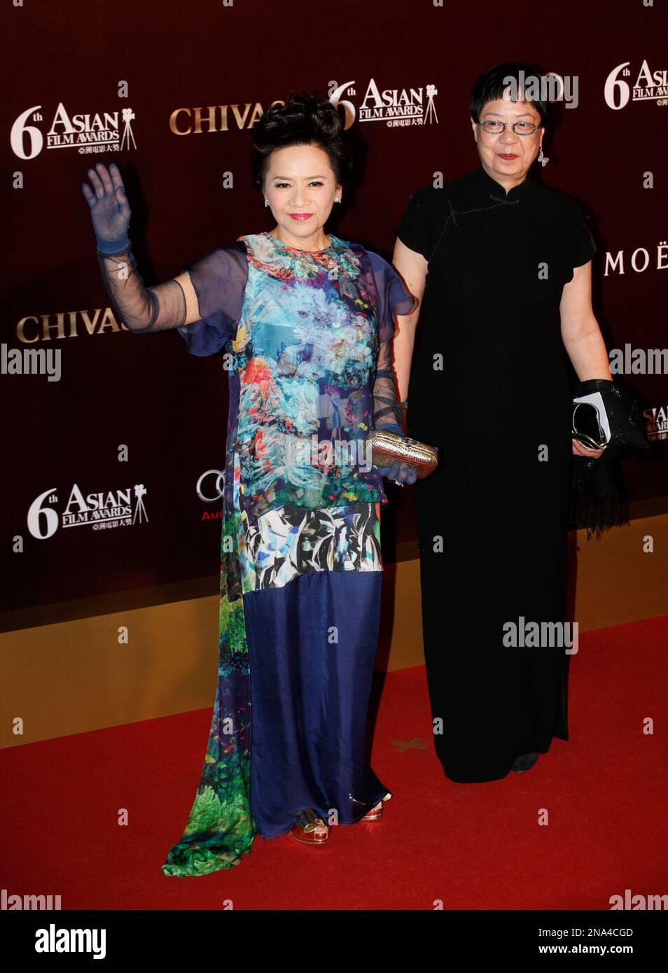 Hong Kong's director Ann Hui, right, poses with actress Deanie Yip on ...