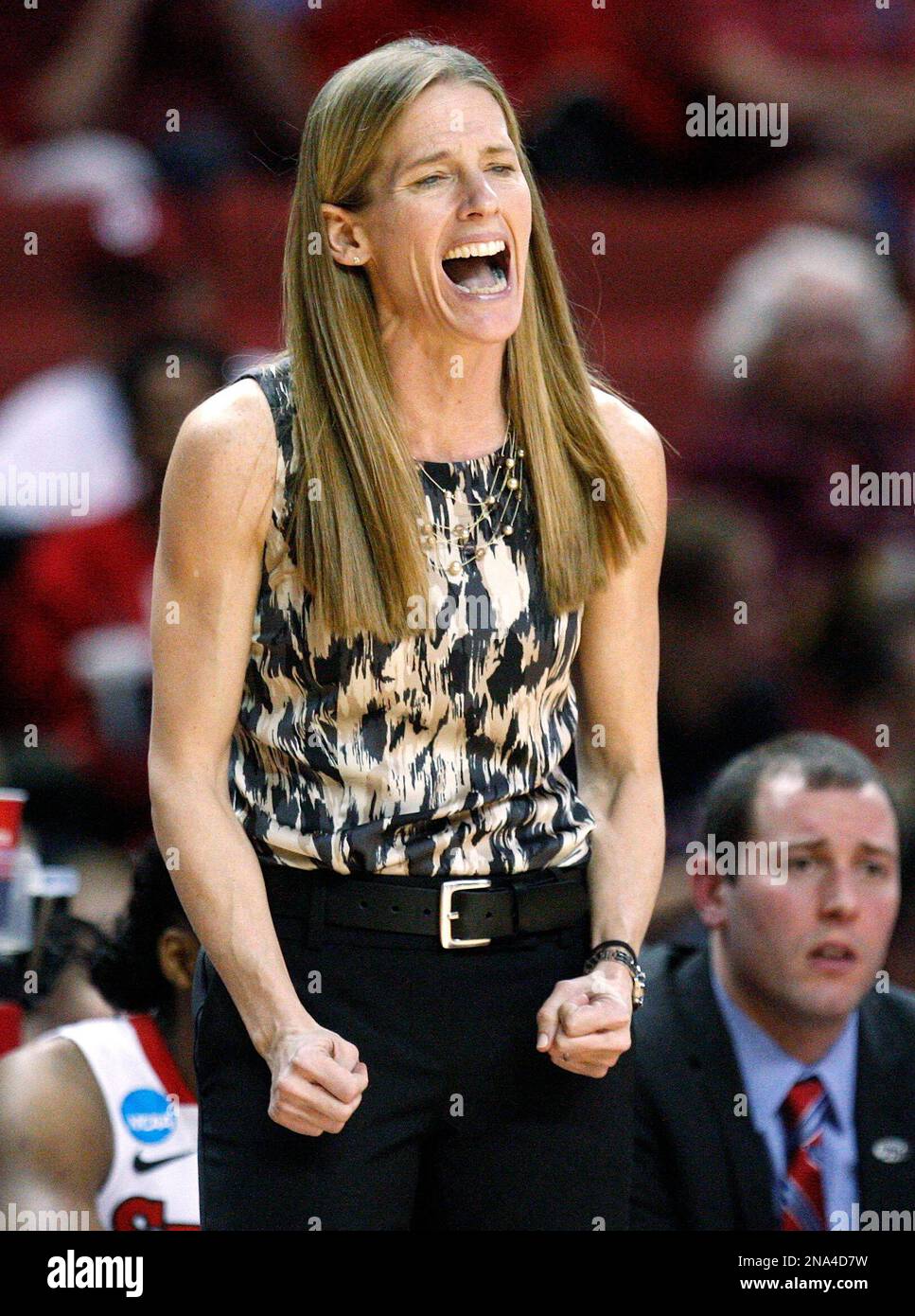 St. John's head coach Kim Barnes Arico shouts to her team in the second ...