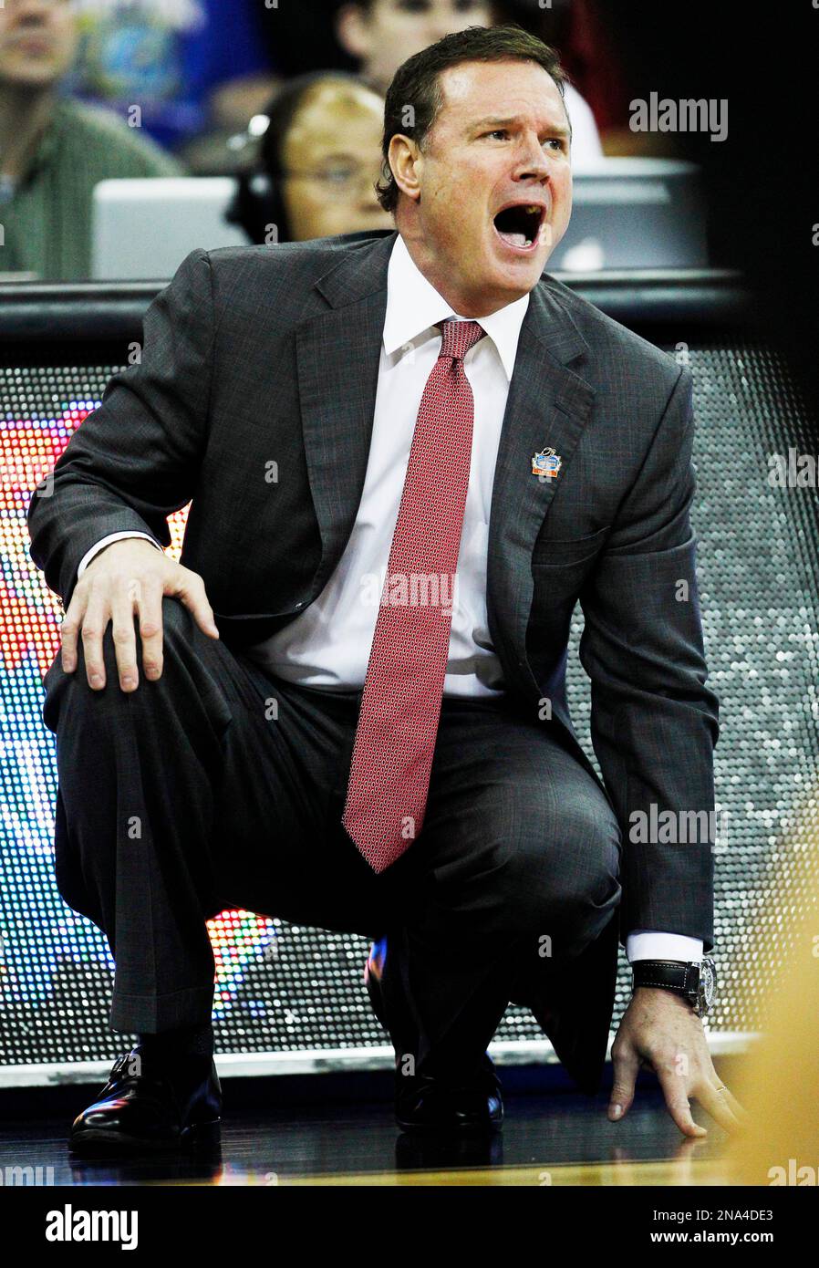 Kansas coach Bill Self yells to his team during the first half of a ...