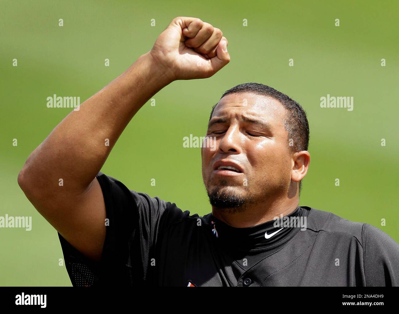 Miami Marlins starting pitcher Carlos Zambrano gestures as he walks off ...