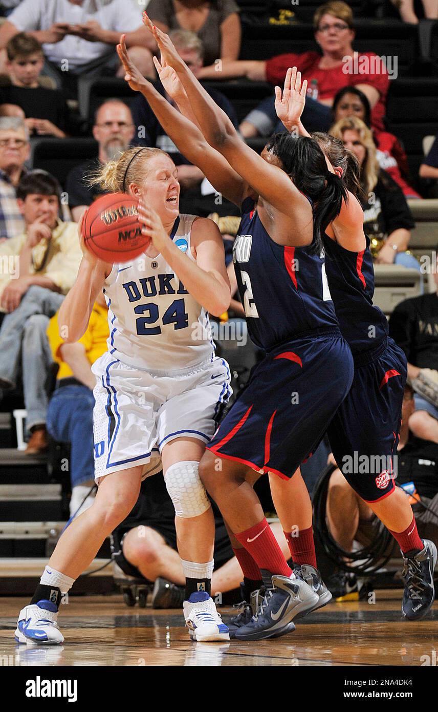 Duke forward Kathleen Scheer (24) gets pressure from Samford forward J ...