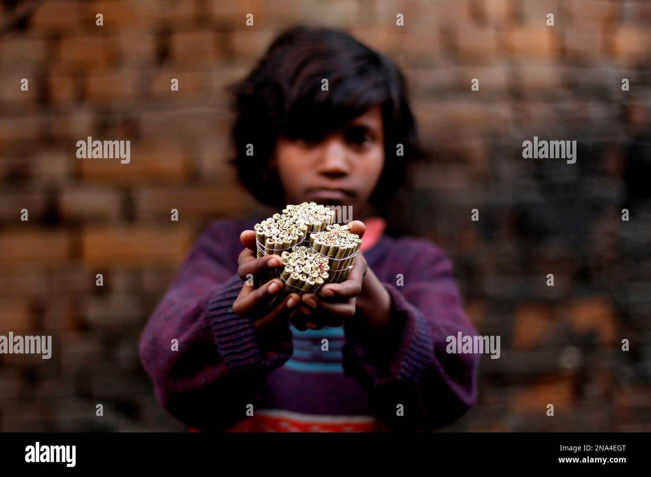 In this Thursday, Jan. 26, 2012 photo, 11-year-old Sagira Ansari holds ...