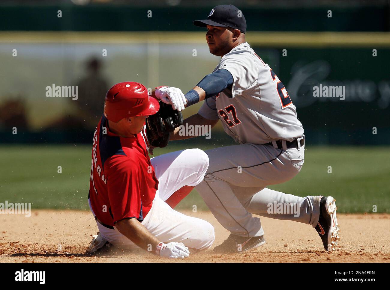 Detroit Tigers shortstop Jhonny Peralta (27) is late with the tag on ...