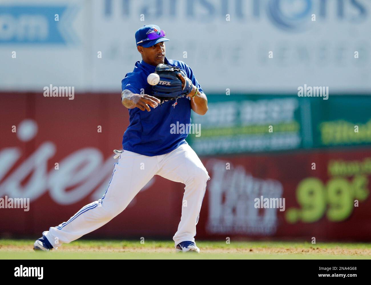Toronto Blue Jays shortstop Yunel Escobar fields grounders before their ...