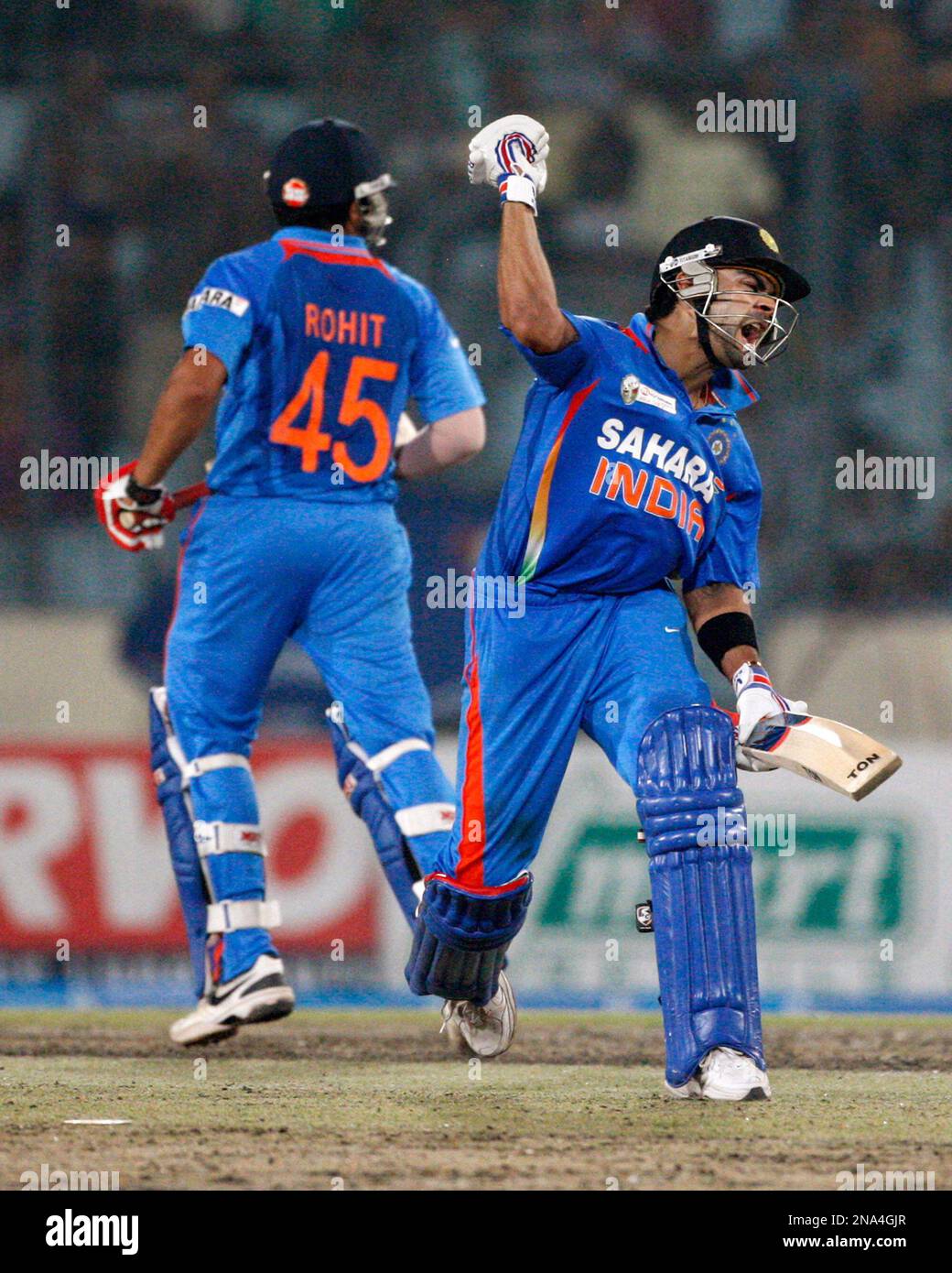 Indian's Virat Kohli celebrates after scoring a century during their ...