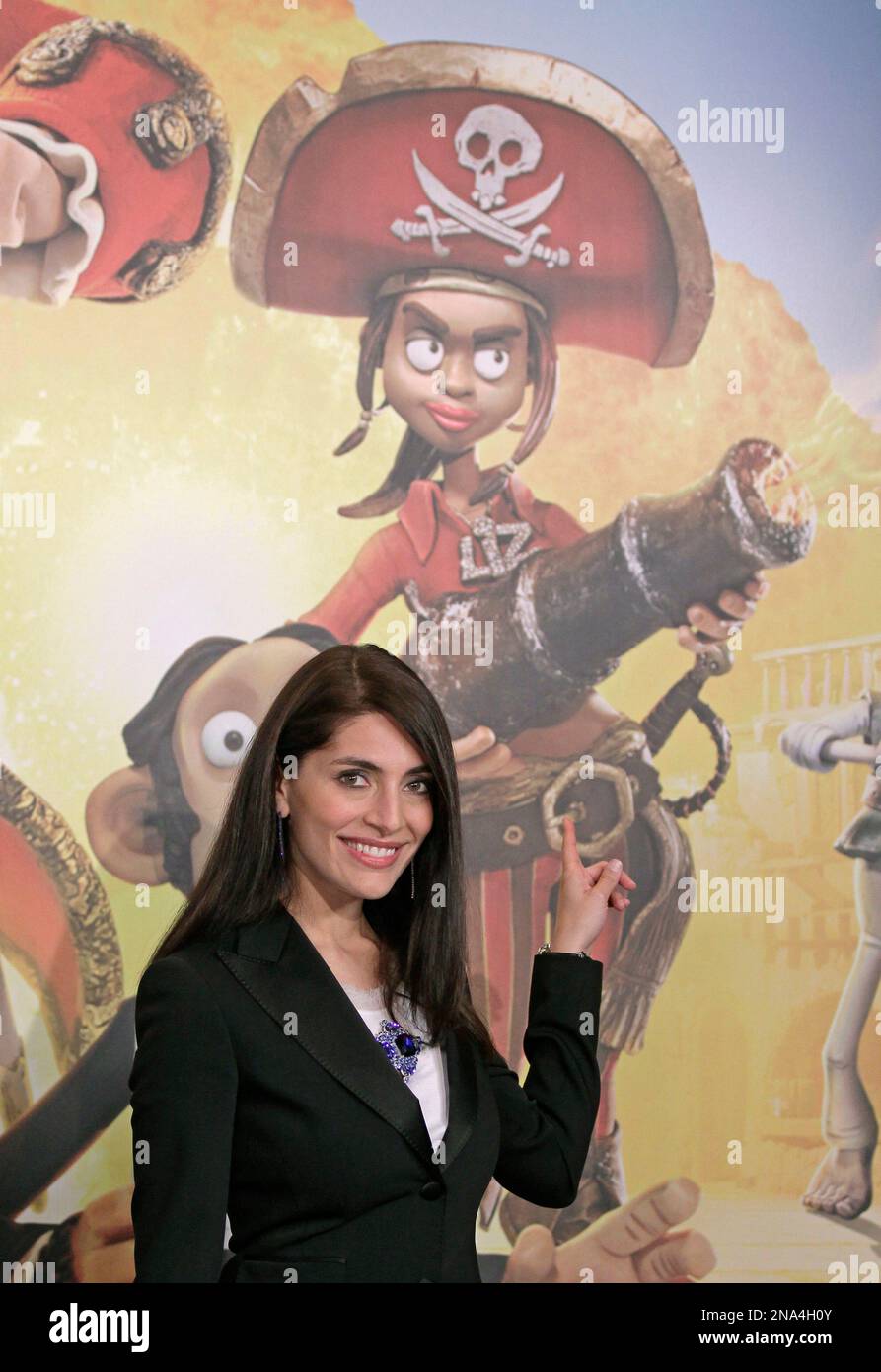 French Actress Caterina Murino Points To An Animated Character Cutlass