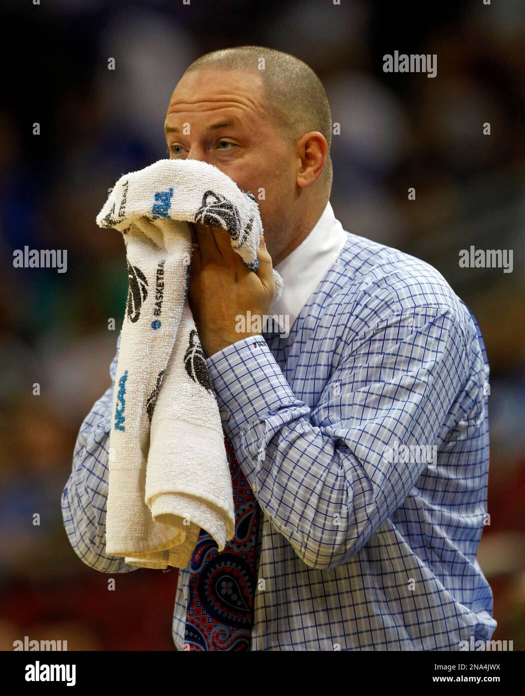 Marquette head coach Buzz Williams watches the first half of their NCAA ...