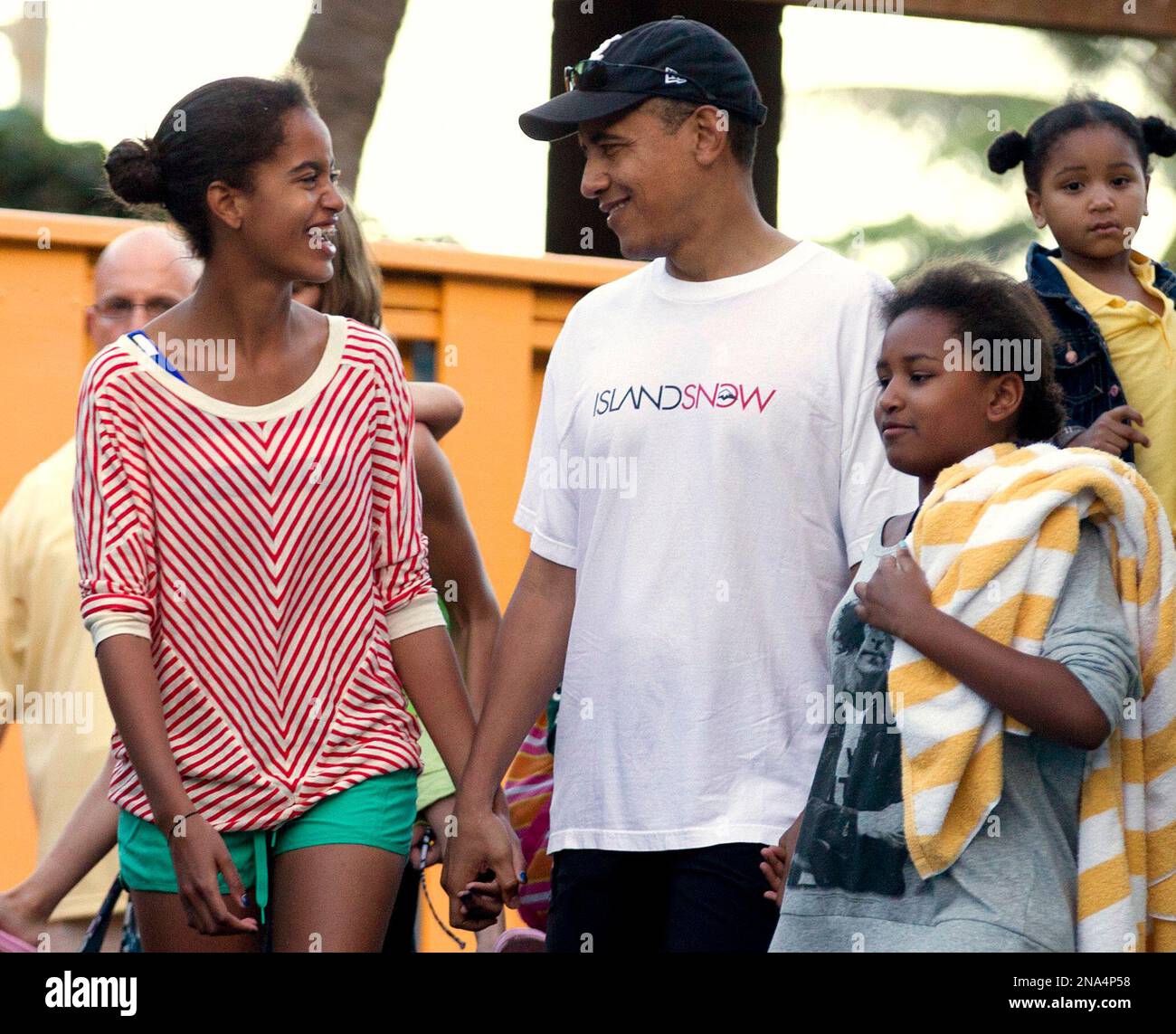 FILE - In this Dec. 27, 2011, file photo President Barack Obama holds ...