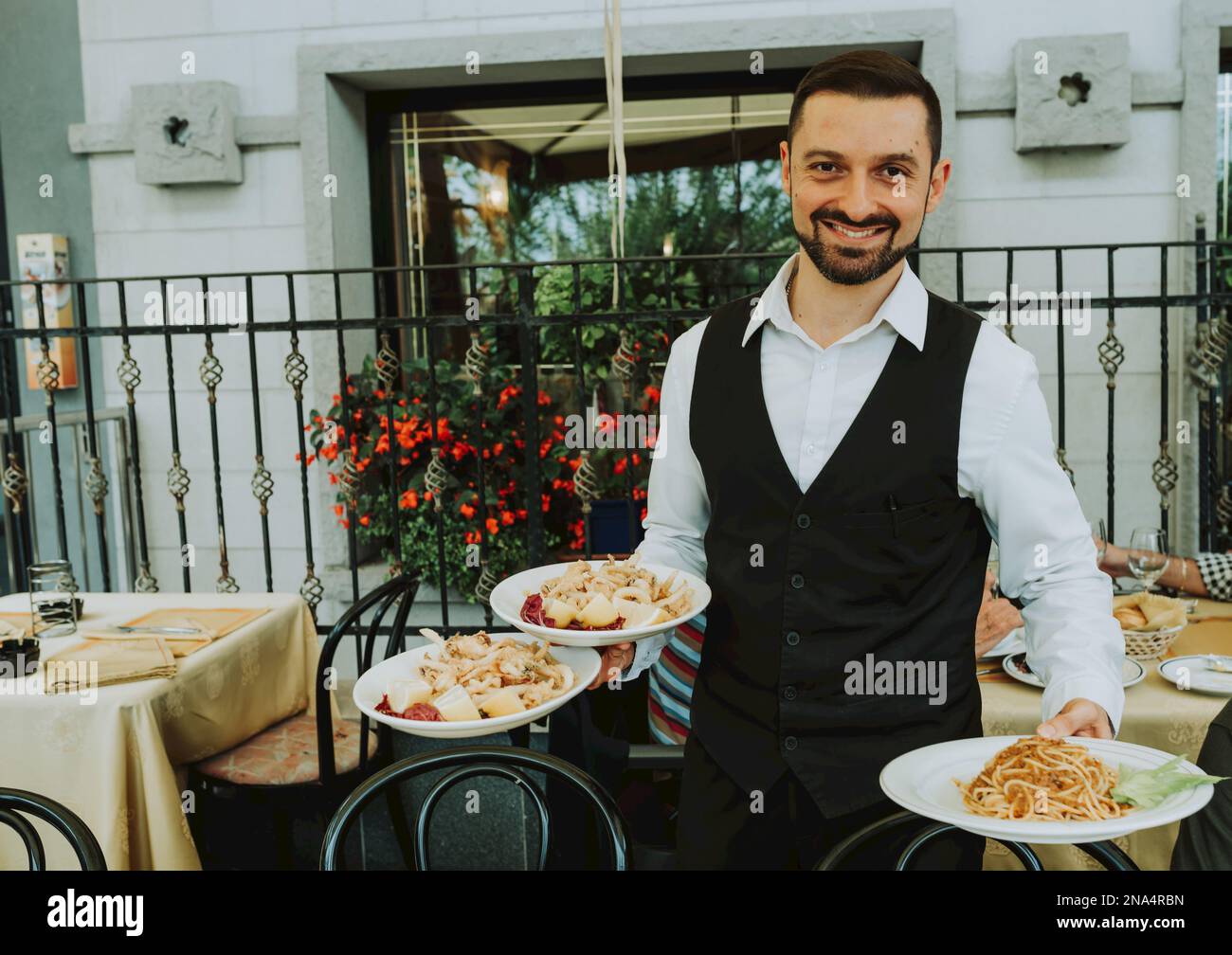 Waiter uniform hi-res stock photography and images - Alamy