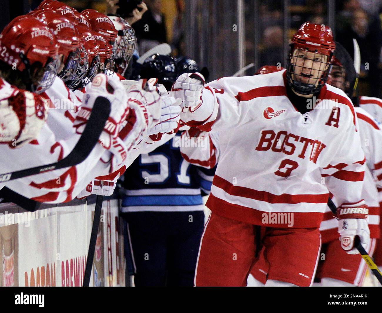 Boston University's Alex Chiasson celebrates his goal against Maine ...