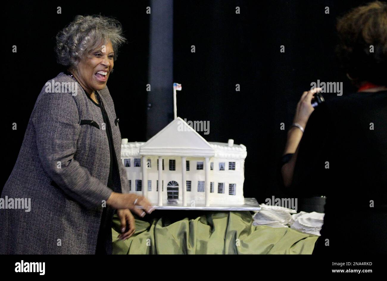 Jerry Banks, left, the aunt of actor Tyler Perry, reacts as she has her ...