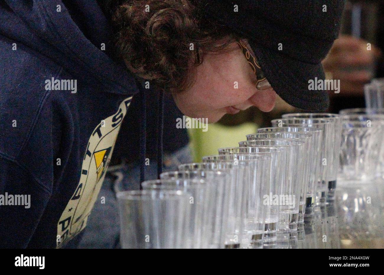 In this photo made on Saturday, Feb. 11, 2012, Theresa Rey leans over a ...