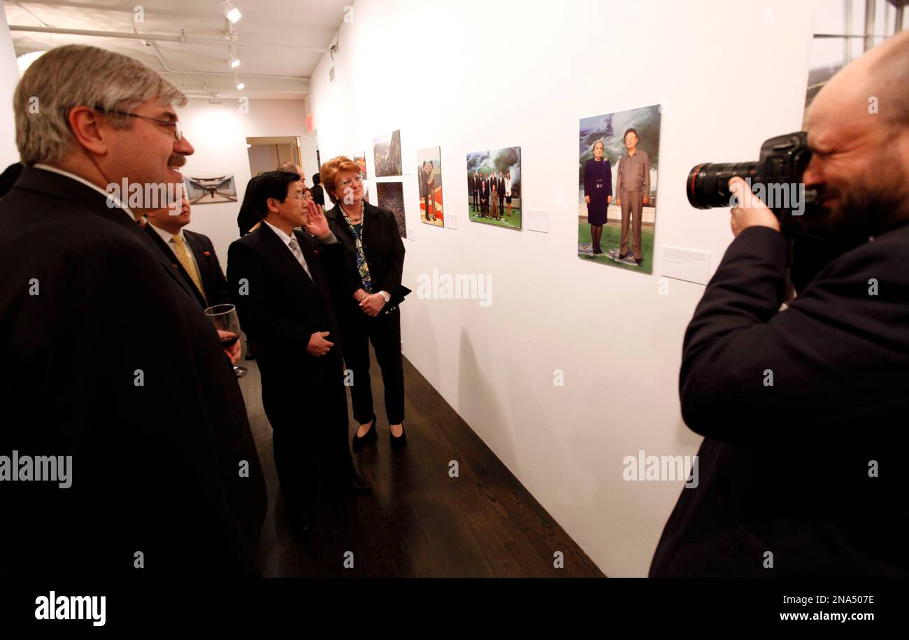 Associated Press photographer David Guttenfelder, far right, takes a ...
