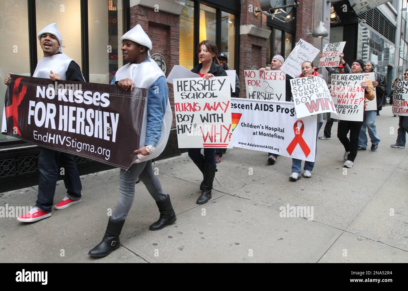 HIV activists protest outside the Hershey's store in New York's Times ...