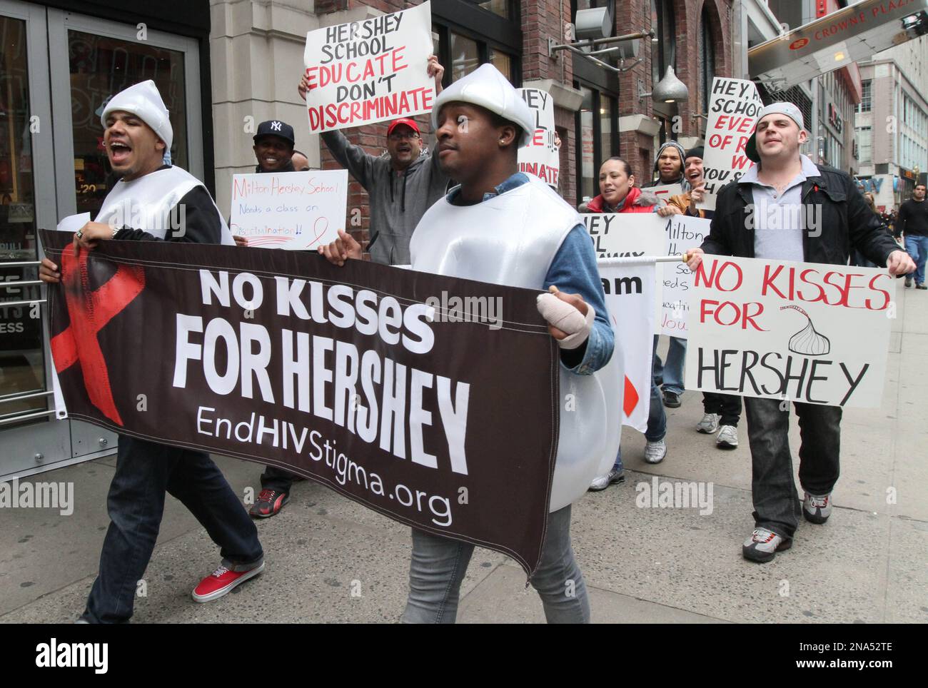 HIV activists protest outside the Hershey's store in New York's Times ...