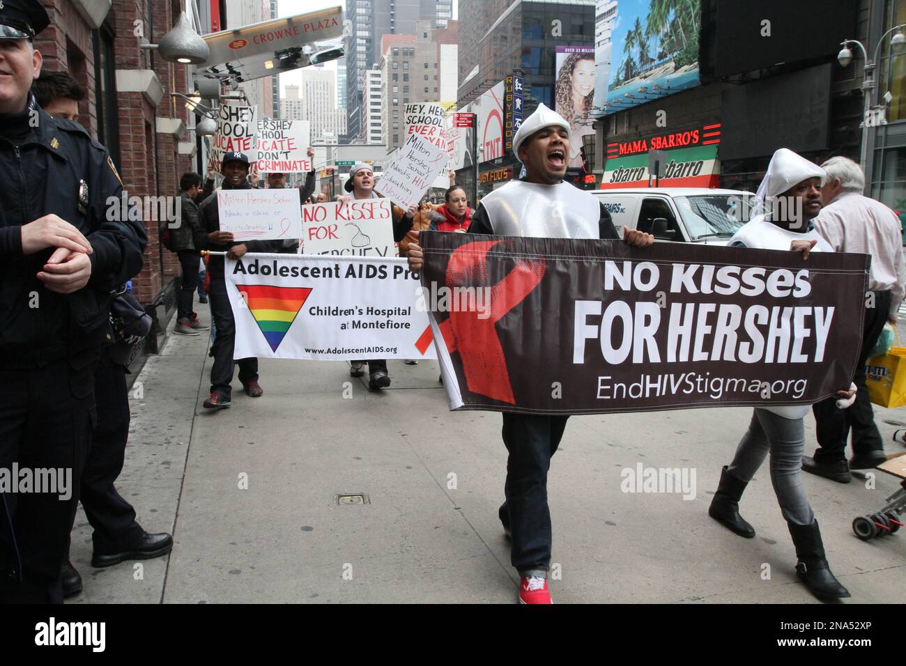 HIV activists protest outside the Hershey's store in New York's Times ...