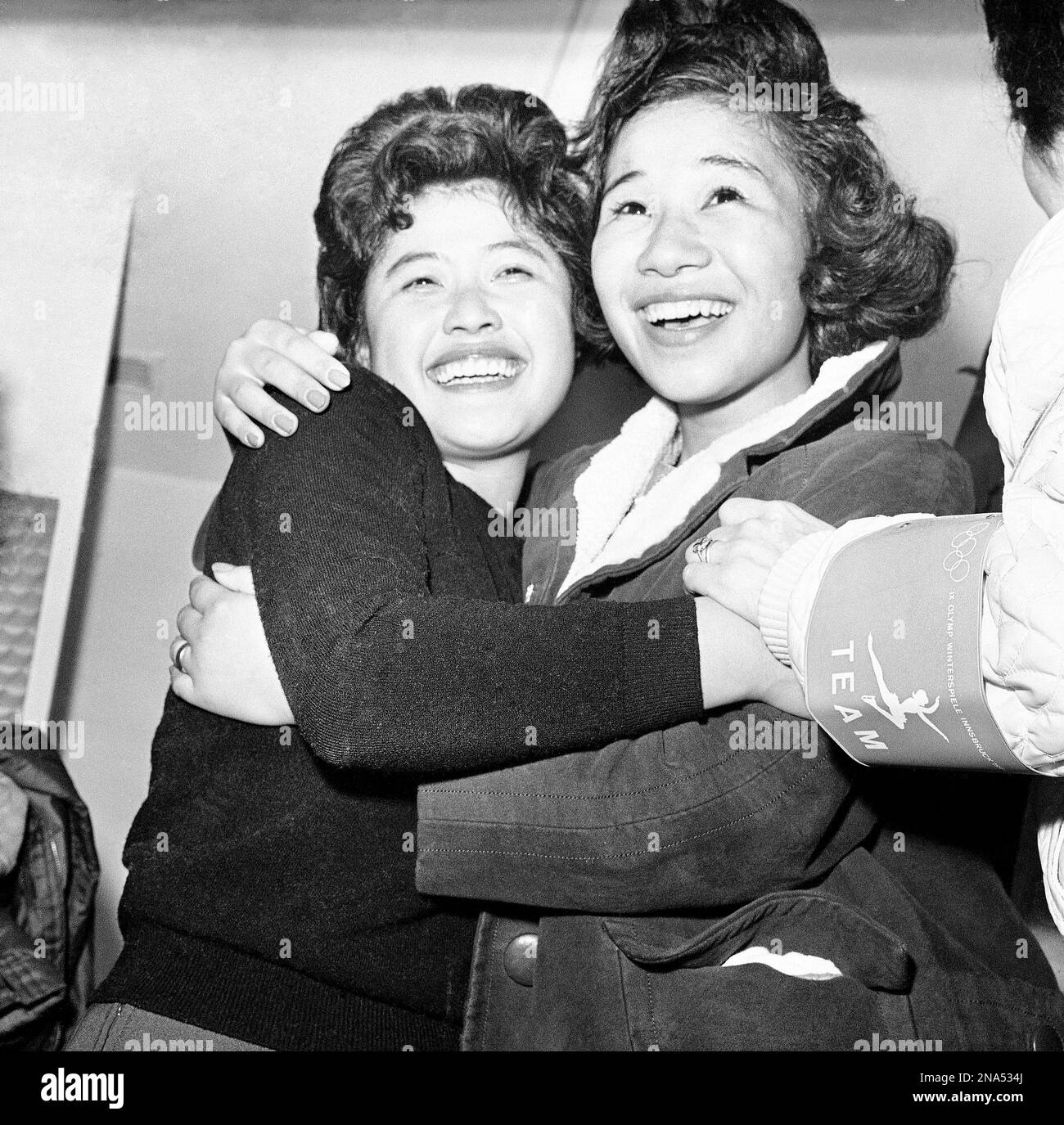 Japanese figure skaters Kumiko Okawa, left, and Miwa Fukuhara hug each ...