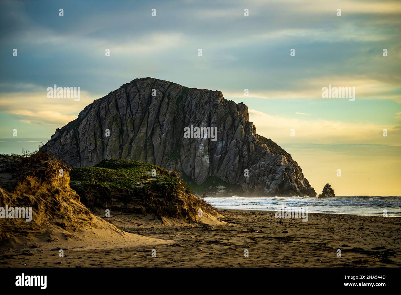 Morro Rock as the sun sets at Morro Bay, California Stock Photo - Alamy
