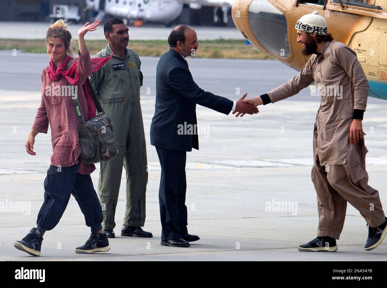 Swiss couple David Och and Daniela Widmer, left, arrive at Qasim ...